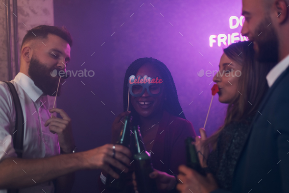 Happy group of friends dancing on a party in a club Stock Photo by ...