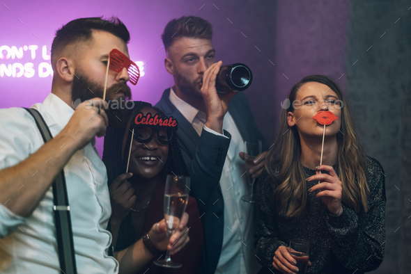Happy group of friends dancing on a party in a club Stock Photo by ...