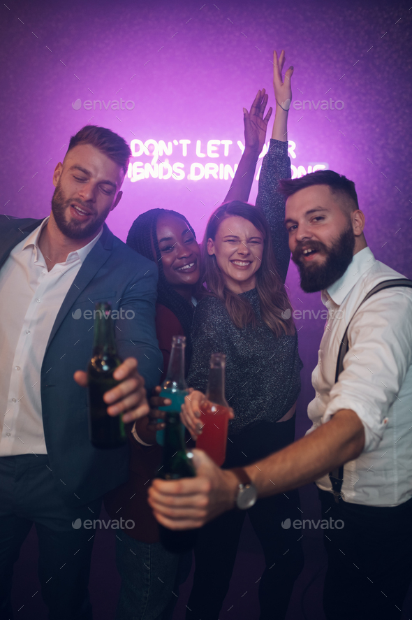 Happy group of friends dancing on a party in a club Stock Photo by ...