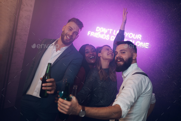 Happy group of friends dancing on a party in a club Stock Photo by ...