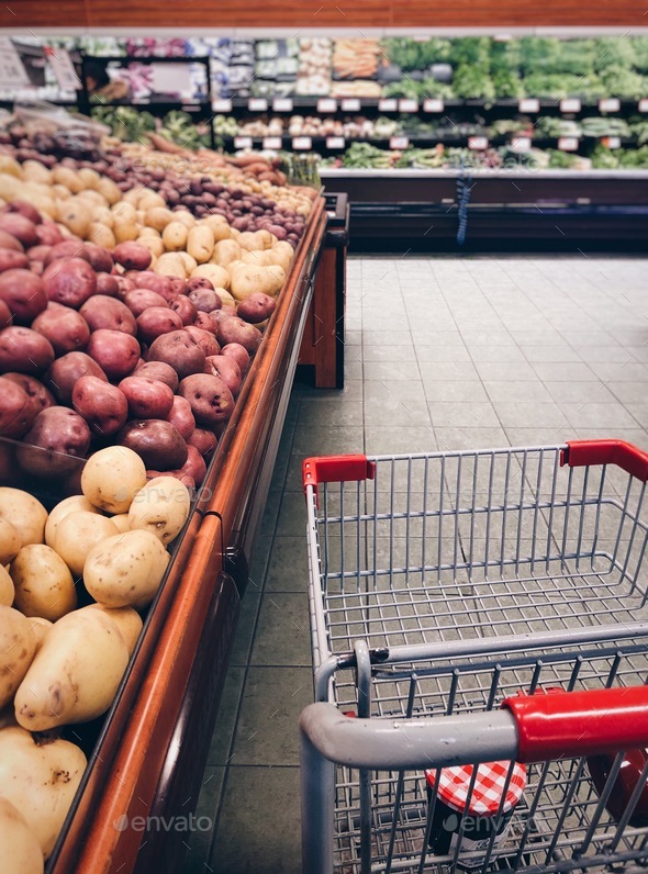 Shopping cart in a produce section of a grocery store. Shop the ...