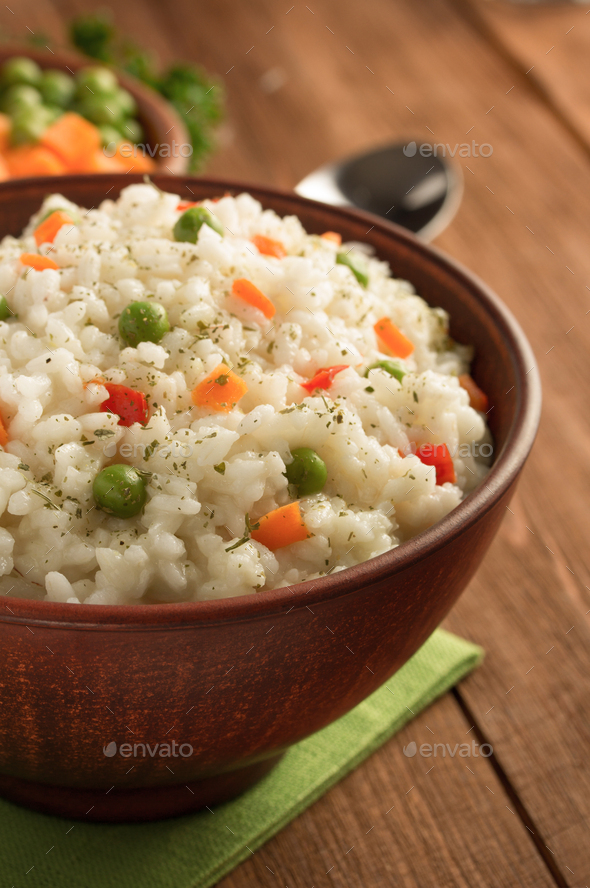 bowl full of rice on wood Stock Photo by seregam | PhotoDune