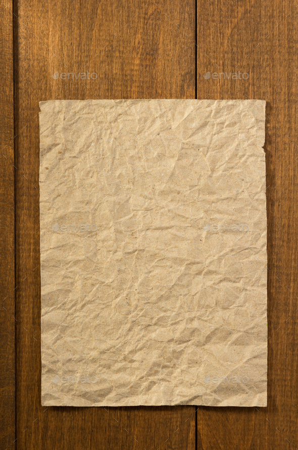 wrinkled note paper on wood Stock Photo by seregam | PhotoDune