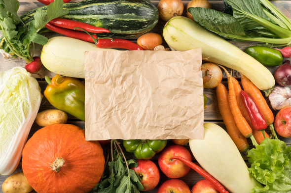 Sheet of paper on mix of different fresh farm vegetables and fruits ...