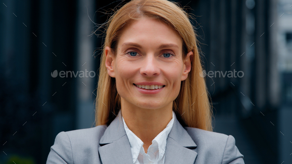 Zooming in on focus close-up female business portrait caucasian ...