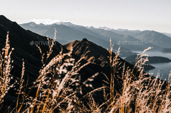 nice view of the big blue lake with calm waters and the impressive high ...