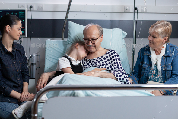 Old man saying goodbye to close family members at hospital Stock Photo ...