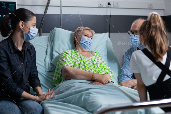 Senior lady recovering from medical operation in clinic Stock Photo by ...