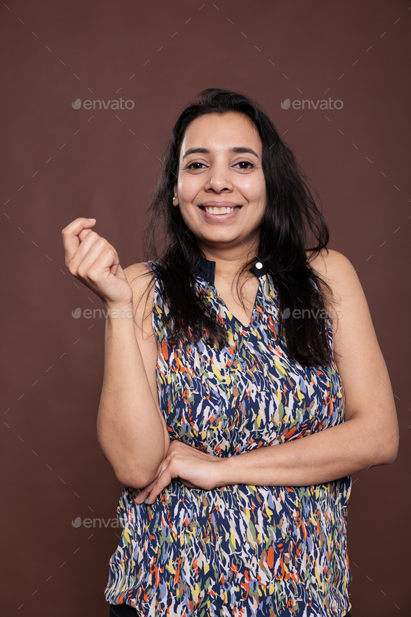 Smiling cheerful indian woman laughing portrait Stock Photo by DC_Studio