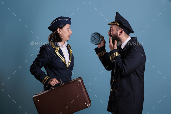 Stewardess and airplane pilot running late at airport Stock Photo by DC ...