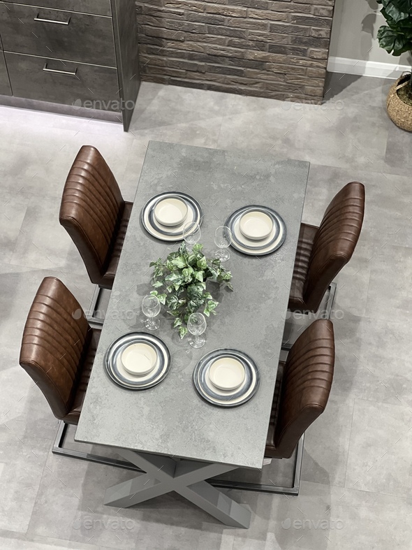 Table laid out in a kitchen Stock Photo by Dobbidodarr | PhotoDune