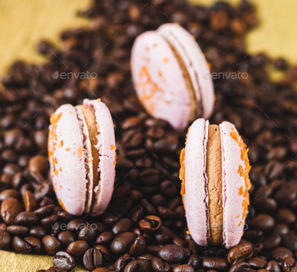 Macarons with coffee and vanilla filling and roasted coffee beans Stock ...