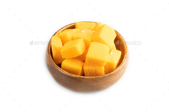 Dried mango cubes in wooden bowls isolated on white, side view Stock ...