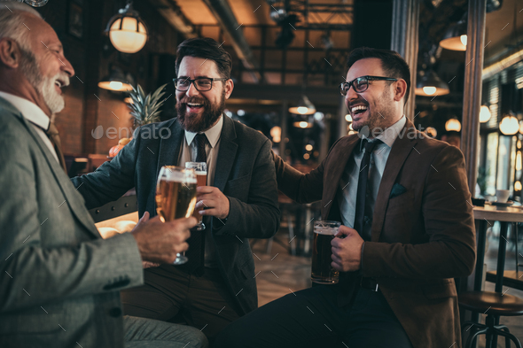 Socializing with the team after work Stock Photo by bernardbodo | PhotoDune