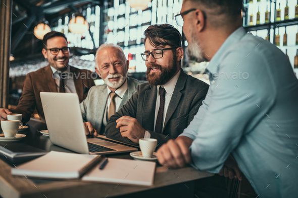 Teamwork in the pub Stock Photo by bernardbodo | PhotoDune