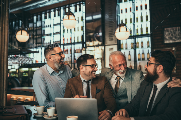 Teamwork at the pub Stock Photo by bernardbodo | PhotoDune