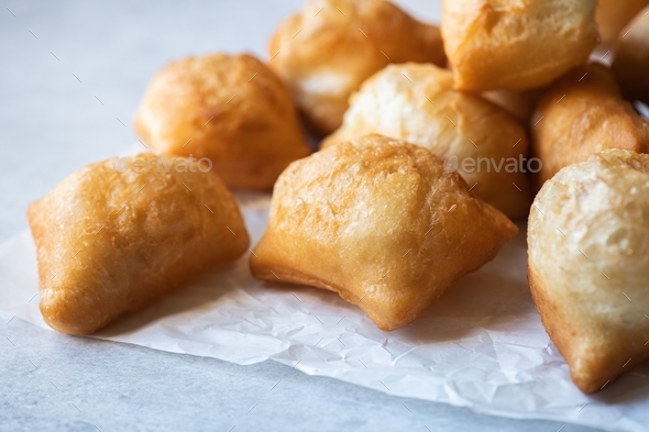 Kazakh national baking - Baursak. Traditional baking, deep fried pieces ...