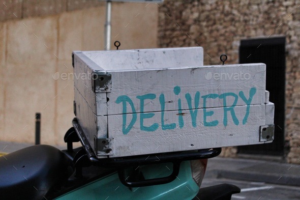 Delivery box on the back of a scooter Stock Photo by pernilla11 | PhotoDune