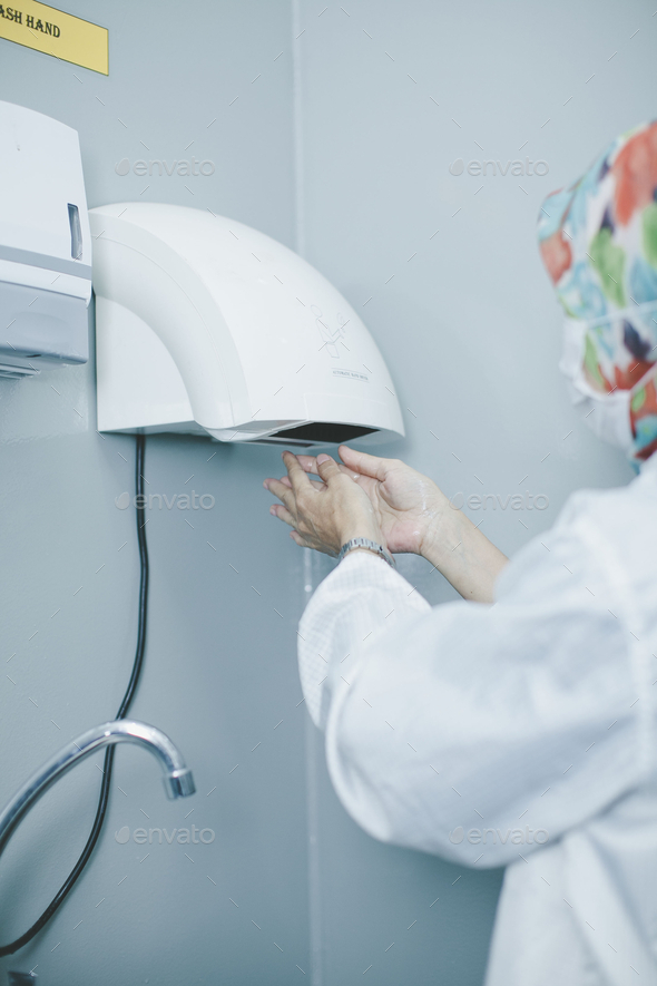 People dry hand after wash Stock Photo by hakimihaslan | PhotoDune