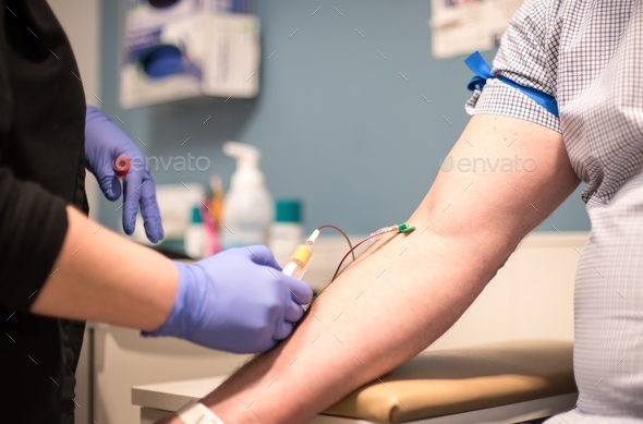 Getting bloodwork done at the doctors office Stock Photo by krisprahl
