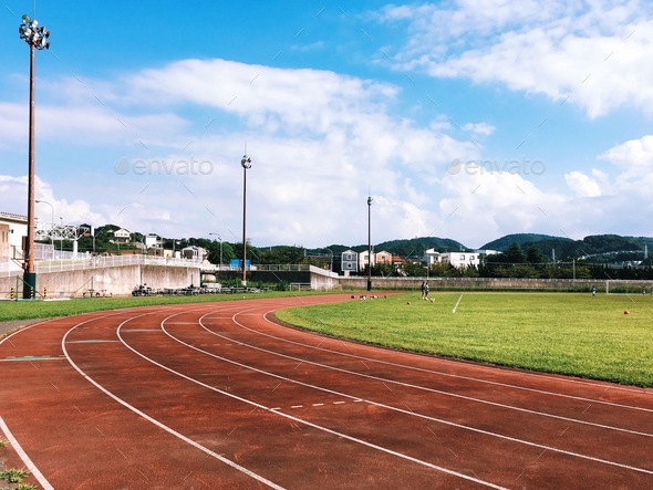 Running track on a sunny day. Track and field. Stadium. Athletics ...