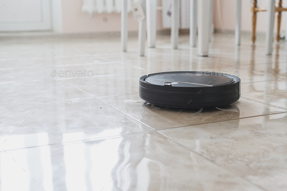 the automatic remote house cleaning, robot cleaner at home on the floor ...