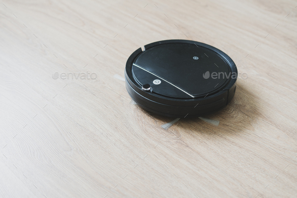 the automatic remote house cleaning, robot cleaner at home on the floor ...