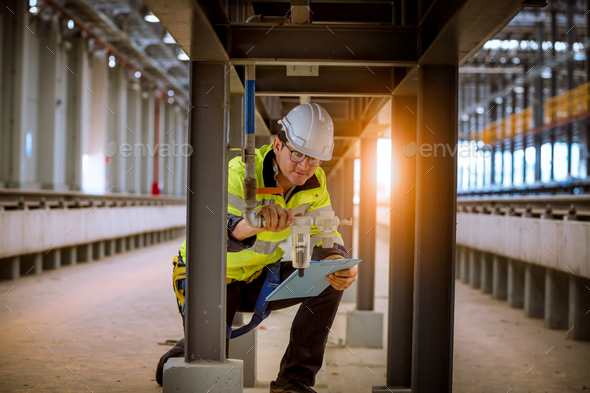 engineer under inspection and checking construction process railway ...