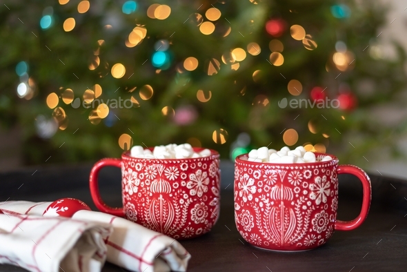 Cozy cups of hot cocoa in front of the Christmas tree Stock Photo by ...