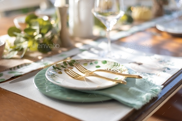 Stylish table setting for the holidays with gold flatware Stock Photo ...