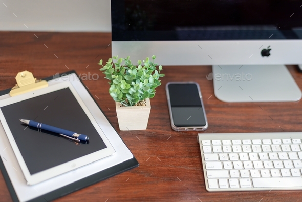Home work station with desktop computer and tablet Stock Photo by krisprahl