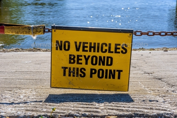 Warning sign that says No vehicles beyond this point Stock Photo by ...