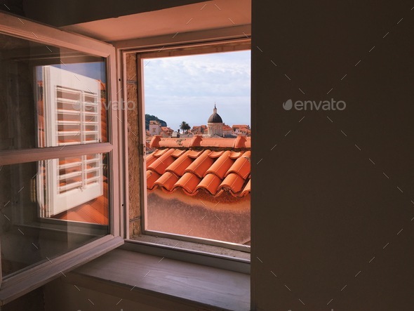 View through the open window of old European town Stock Photo by ...