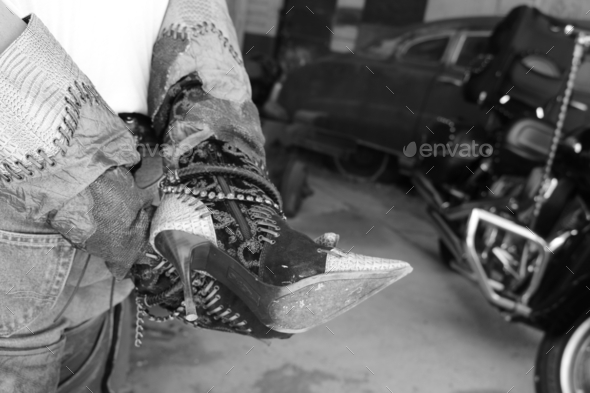 Monochromatic image of female legs wrapped around male waist next to ...