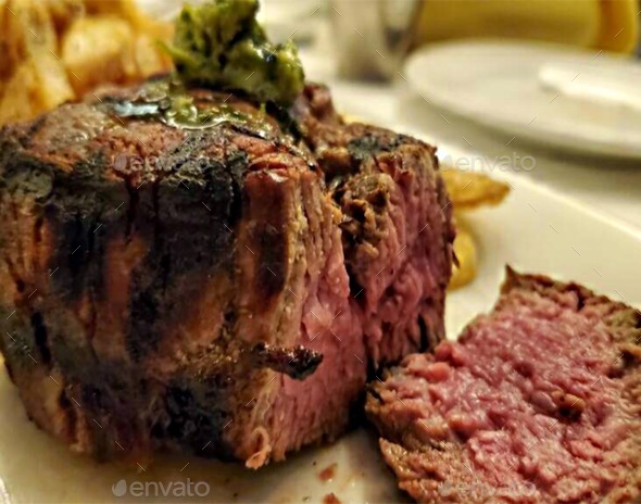 Tender juicy medium rare filet mignon cooked to perfection Stock Photo ...