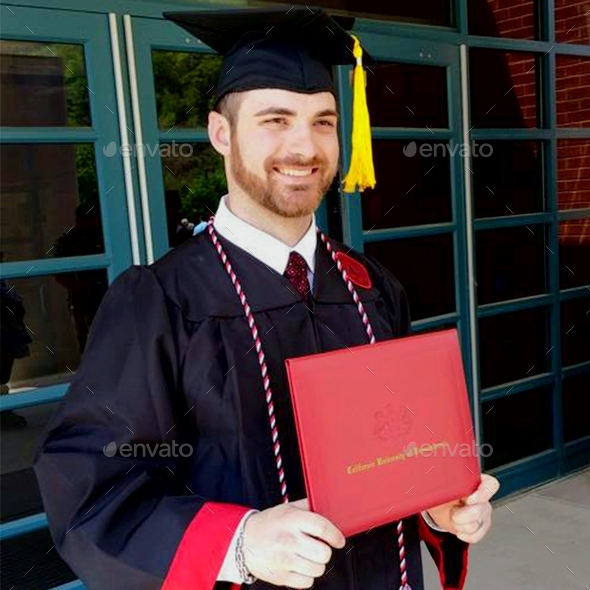 Success: University Summa Cum Laude graduate smiles holding certificate ...
