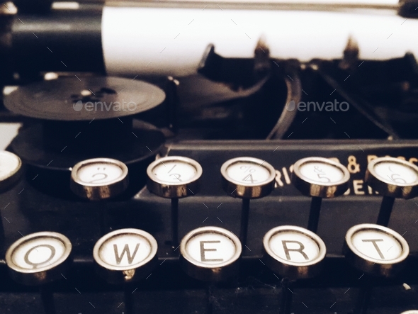 Vintage typewriter buttons on qwerty text Stock Photo by rattodisabina