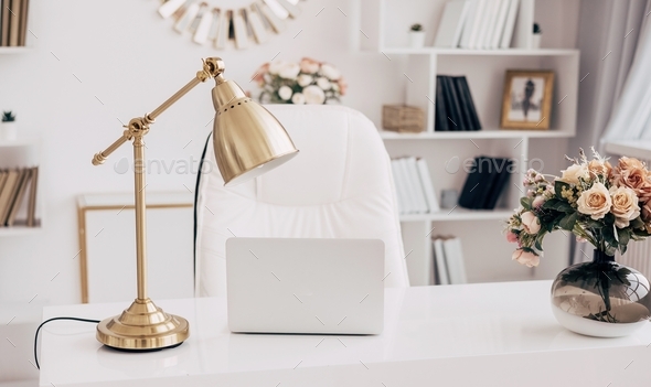 female office with a workspace desk in a light modern style with white ...