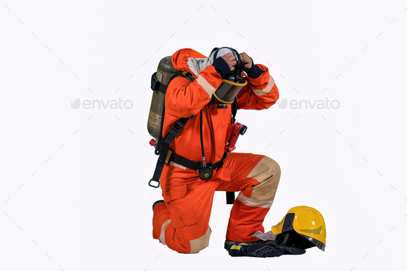 Fire man wearing fire protection suite and oxygen tank demonstration ...