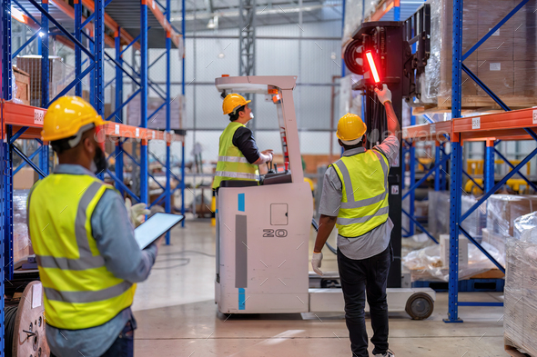 African american working in warehouse hold red light give signal to ...
