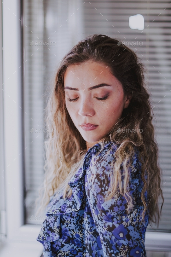 Indoor portrait of a young beautiful romantic woman .Close up portrait ...