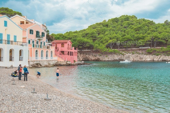 Family having fun at the beach in asos village kefalonia Greece Stock ...