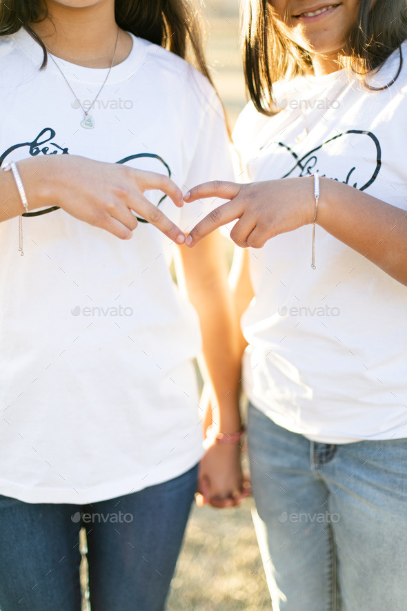 Best friends holding hands Stock Photo by takemewu31 | PhotoDune