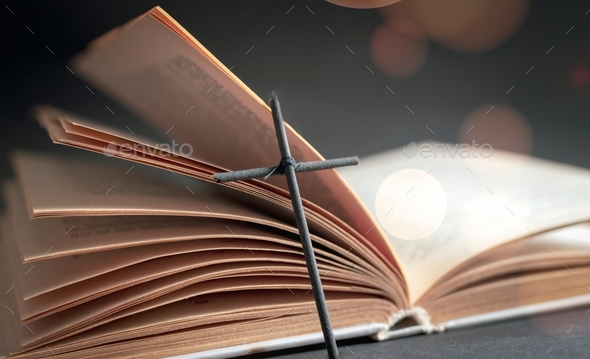 Open bible and cross. An open book. Stock Photo by rstavila1 | PhotoDune