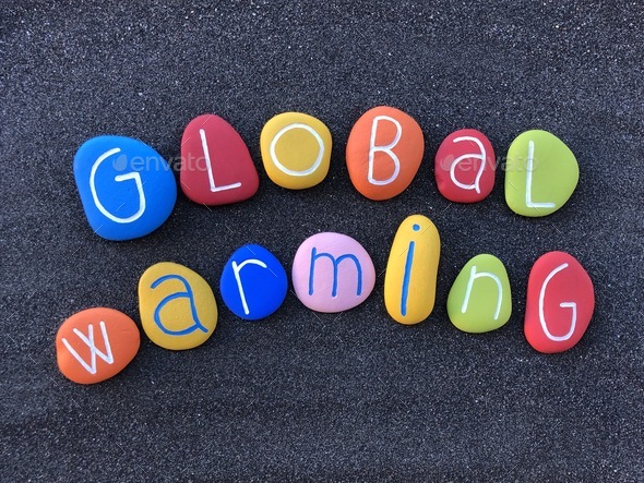 Global warming text composed with multi colored stone letters over ...