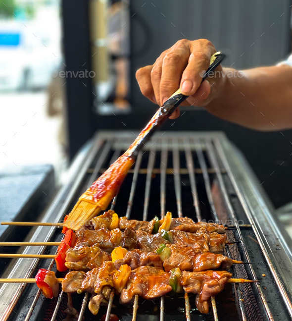 Hand of chef cooking barbecue Stock Photo by Thaitoystory | PhotoDune