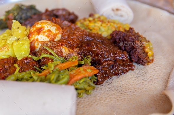 Injera and doro wat Stock Photo by miltongc66 | PhotoDune