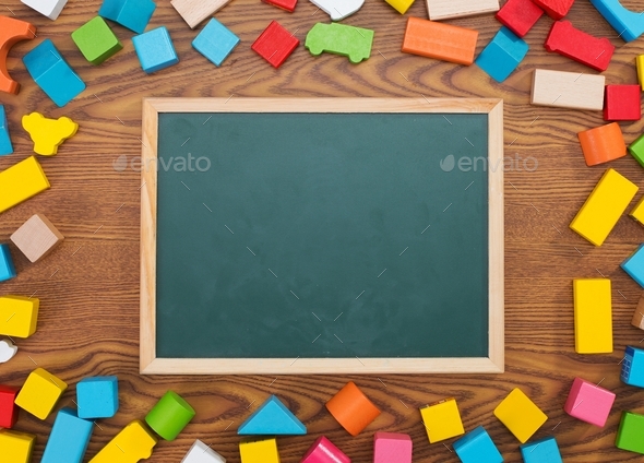 Blank blackboard with colourful wooden block Stock Photo by tehcheesiong