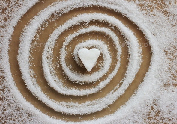 Spiral of love, heart shaped sugar piece Stock Photo by mirarahneva