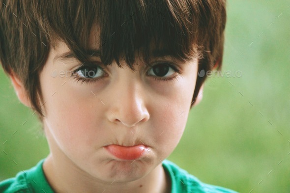 Boy pouting Stock Photo by wdnesday | PhotoDune